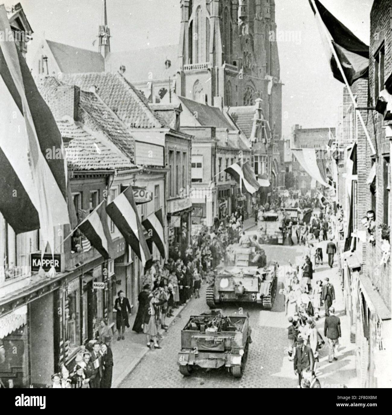 A column from the British 30th Corps drives through Eindhoven on the ...