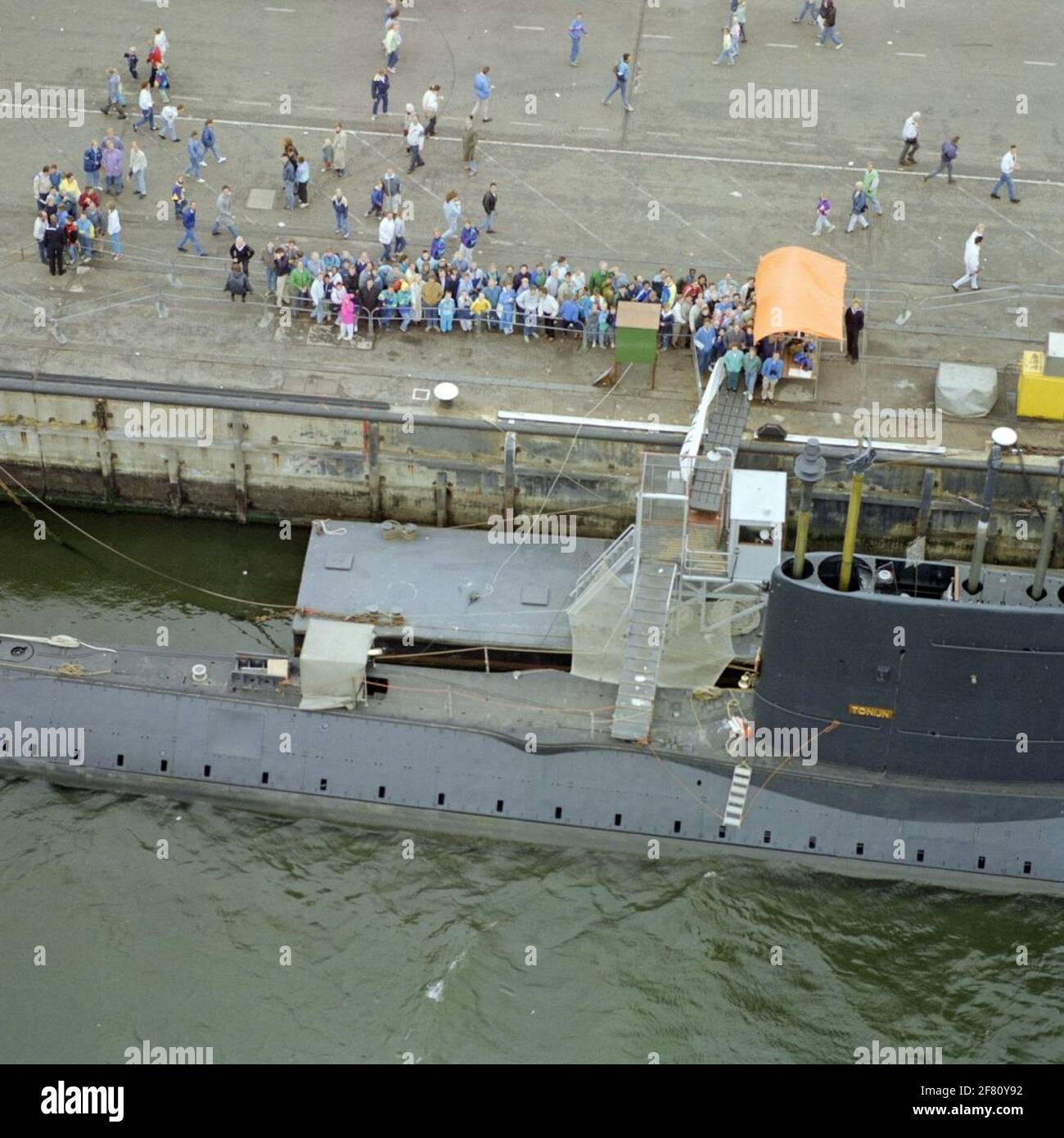 Printed during the Fleet Days 1989. Visitors stand in line to board the ...