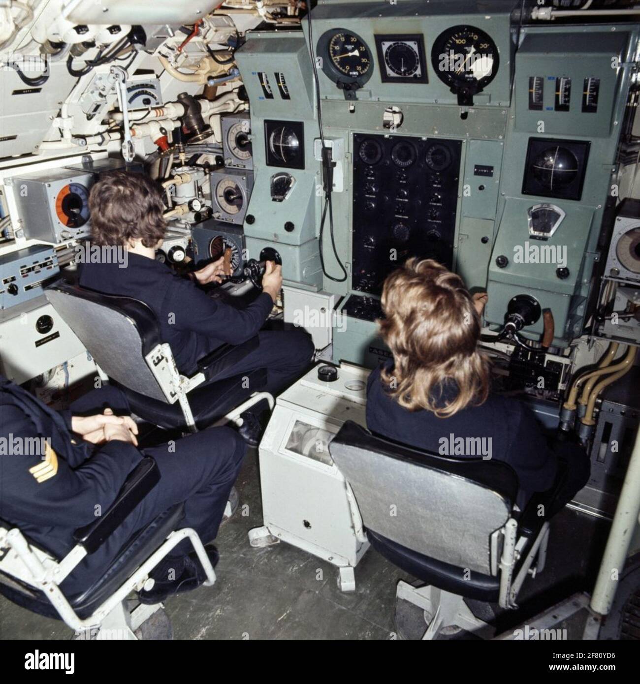 Three crew members in the central of a submarine from the swordfish ...