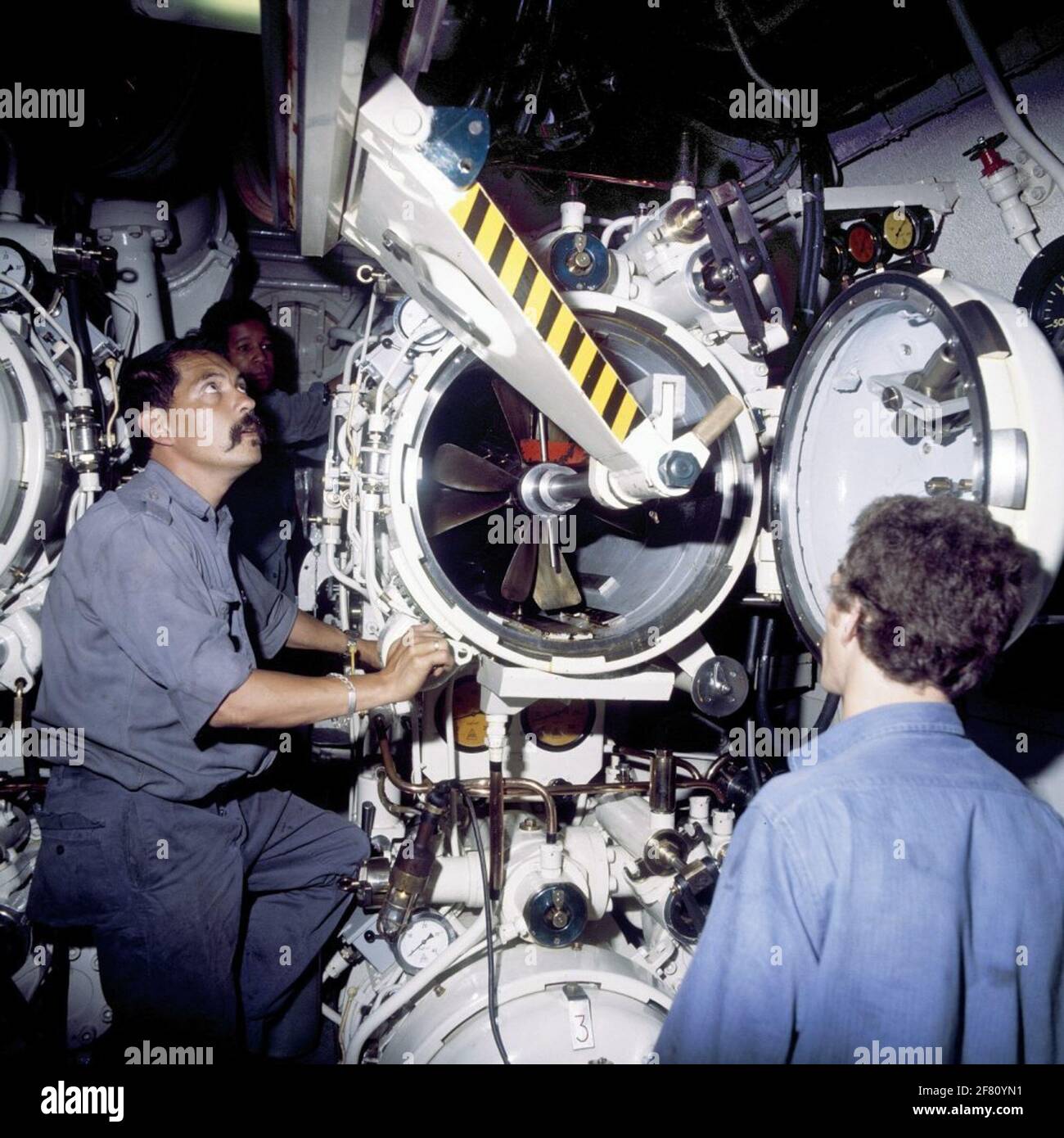 Loading torpedoes in the submarine Hr.Ms. Walrus (ex-USS Icefish, 1953 ...