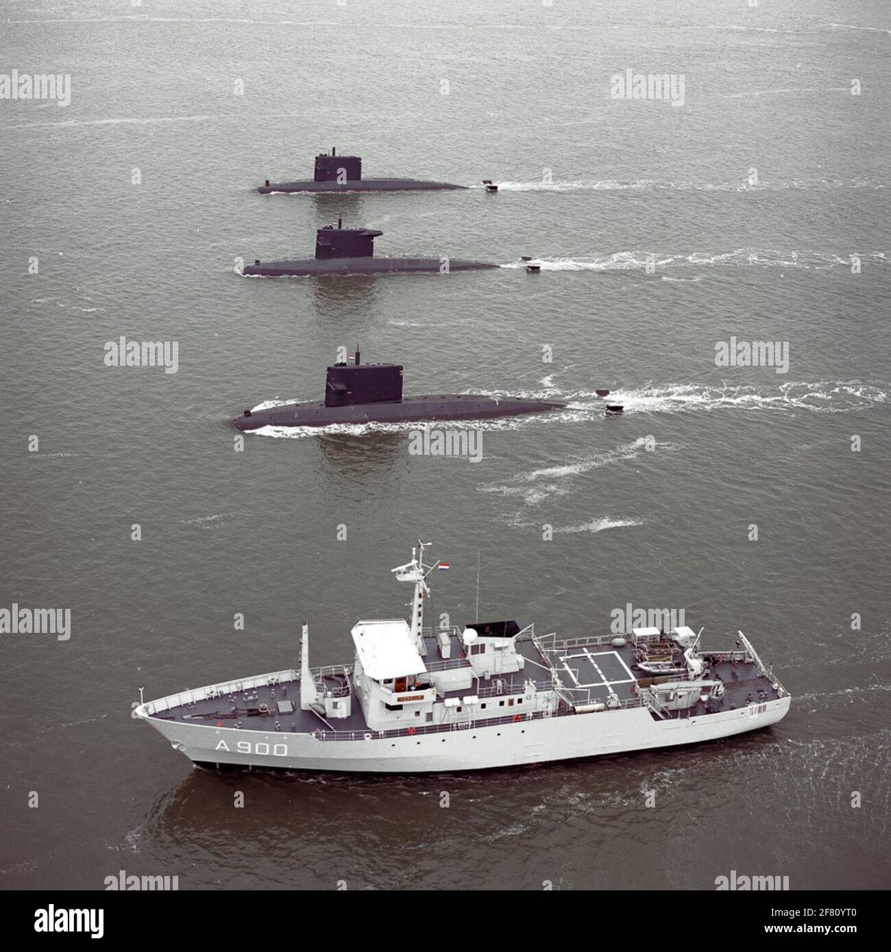 Torpedo ship hr.ms. Mercuur (1987-) with three submarines from the ...