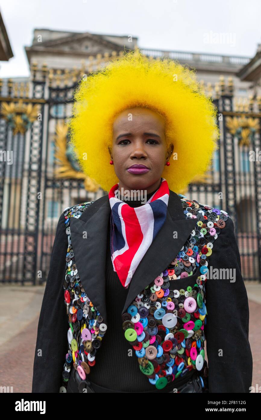 A lady with colorful outfit attends the Prince Philip tribute.Londoners ...