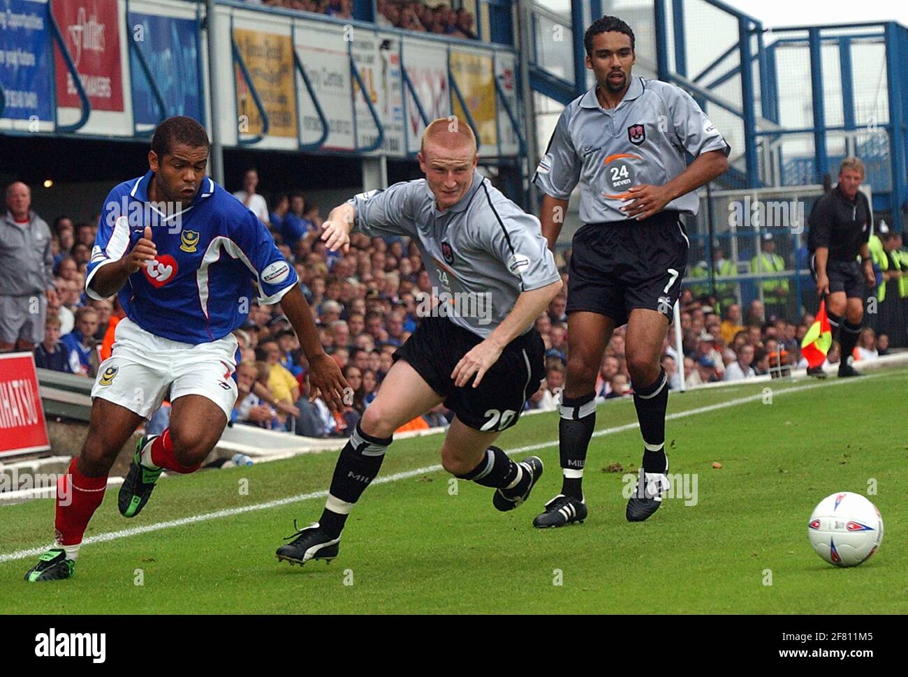 PORTSMOUTH V MILLWALL. KEVIN HARPER GOES PAST BY RONNIE BULL. PIC MIKE ...