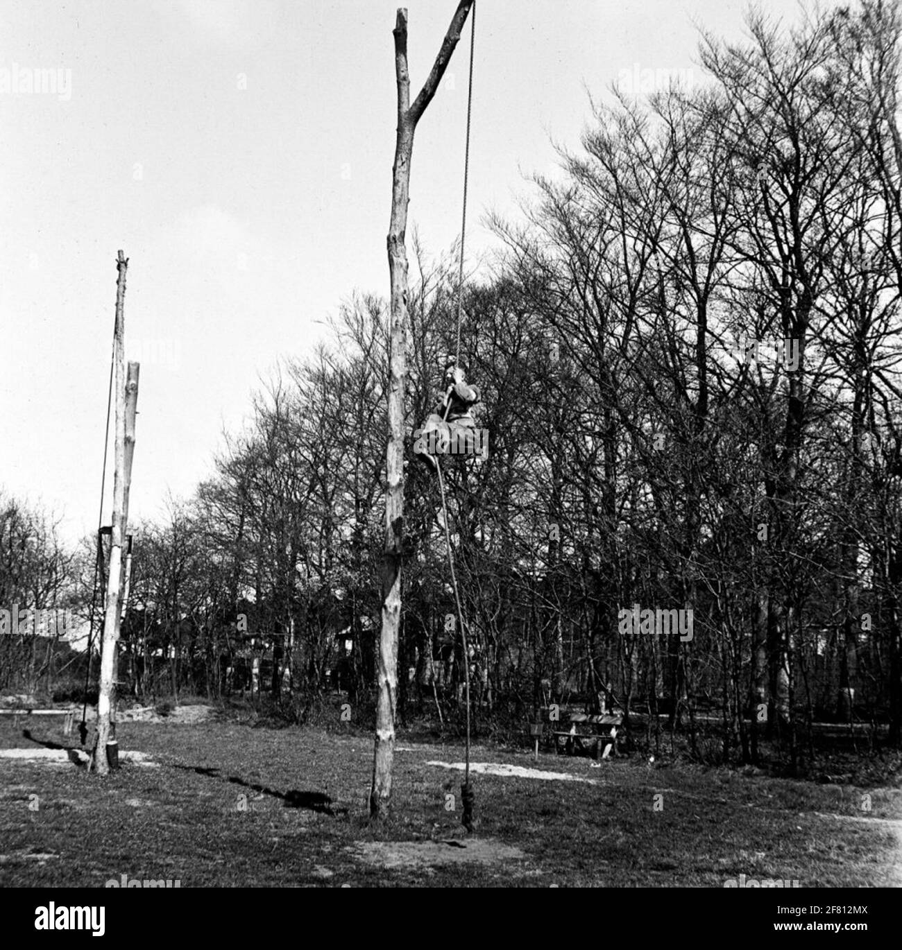 Participant in the practical test of a selection procedure on the rope ...