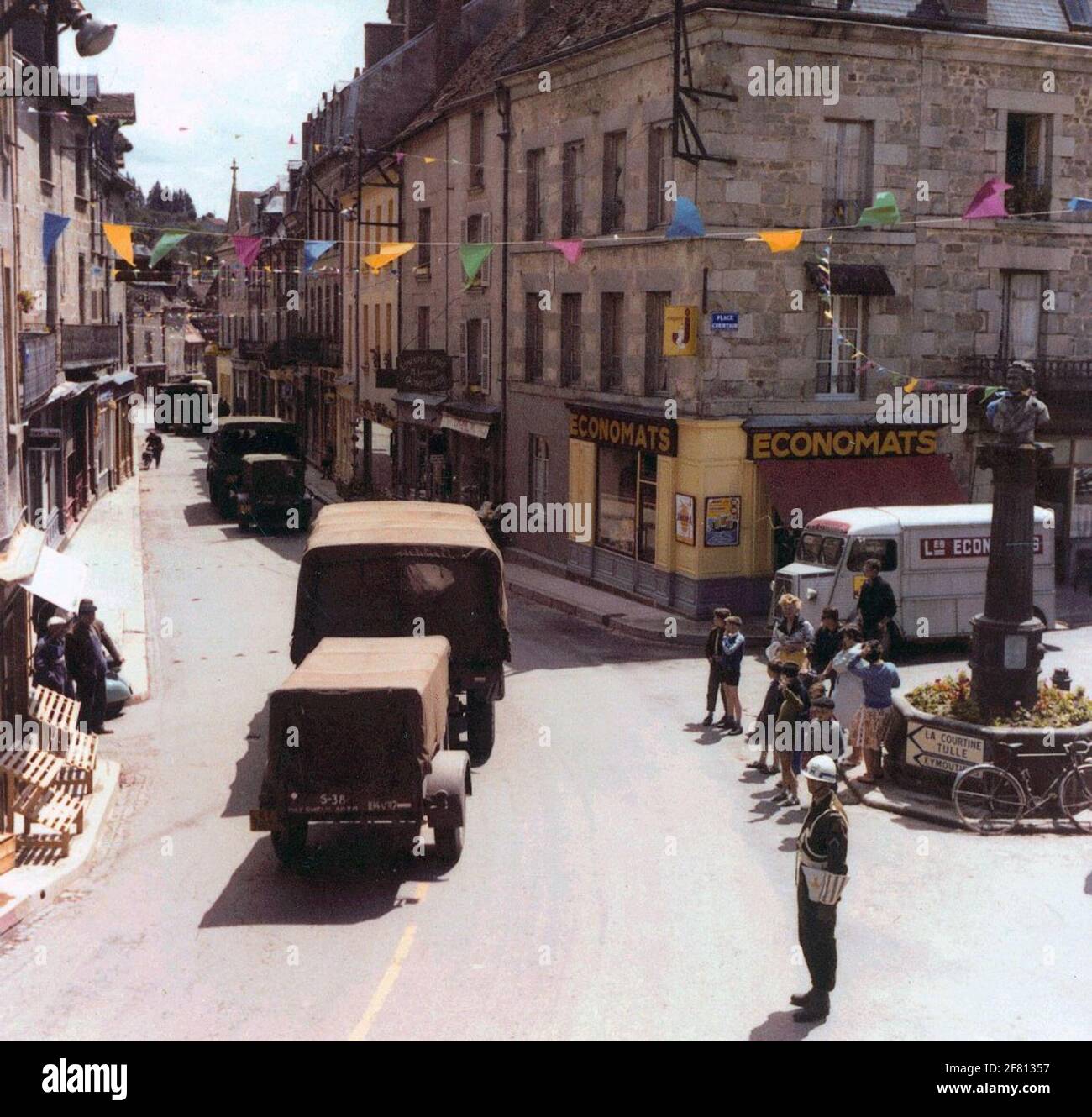 A caravan from Dutch army vehicles drives through a French town, on the ...