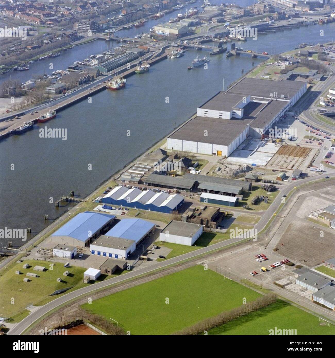 Aerial view of a part of the port of Den Helder (March 1990) with the ...