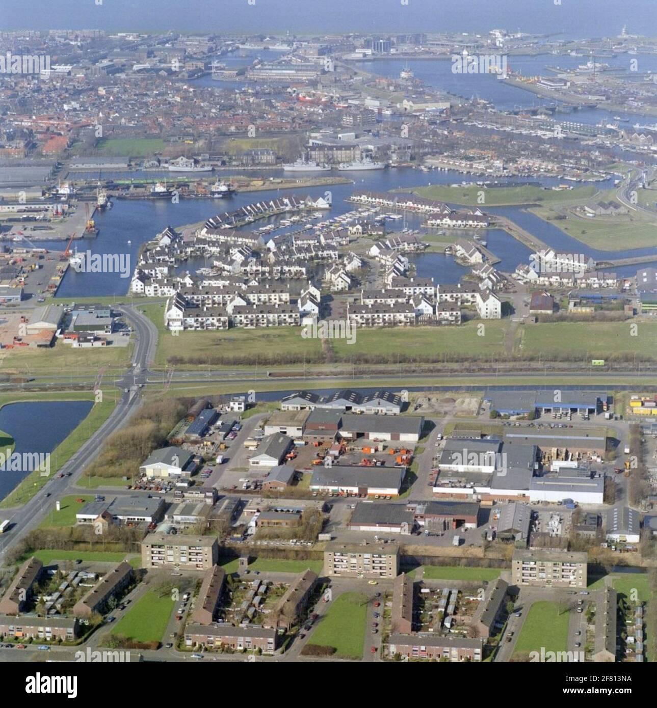 Aerial view of part of the port of Den Helder (March 1990) with a few ...
