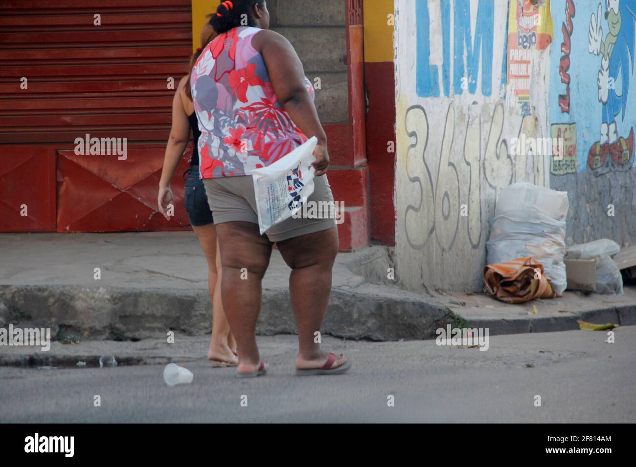 salvador, bahia / brazil - august 27, 2013: People with abdominal fat ...