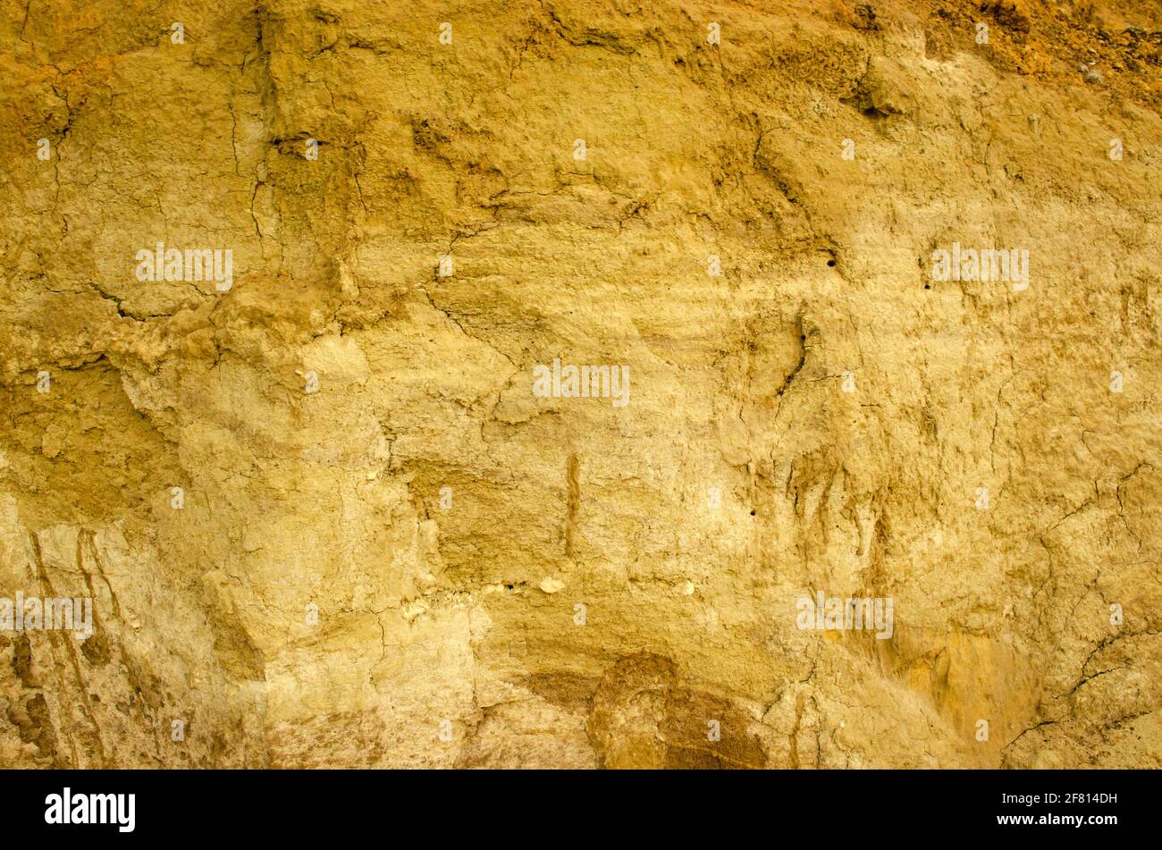 Natural background - vertical wall of sand in sand pit. soil texture ...