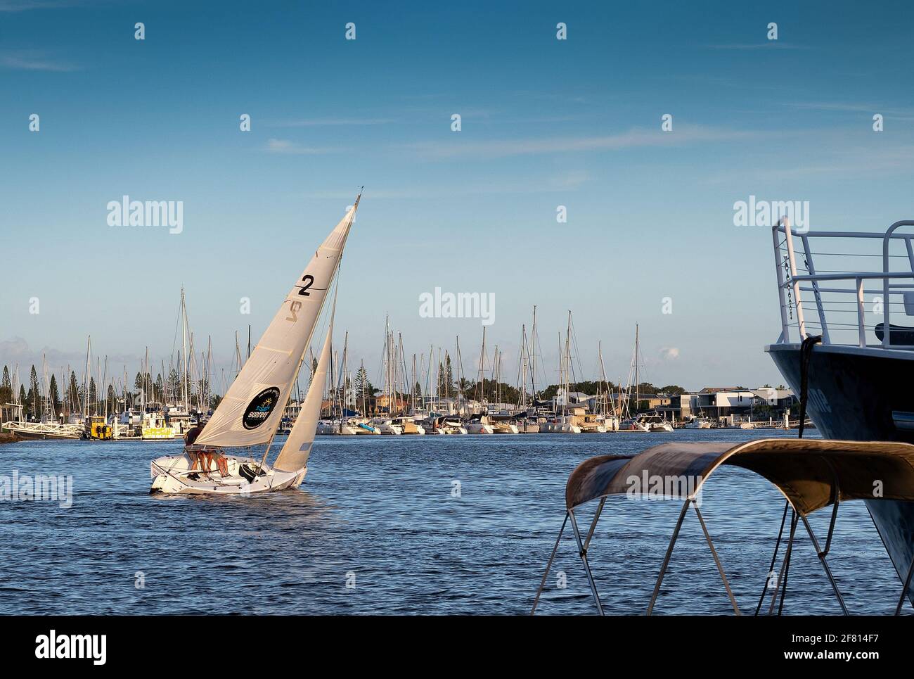 MOOLOOLABA, AUSTRALIA - Apr 02, 2021: A yacht with two students and a ...