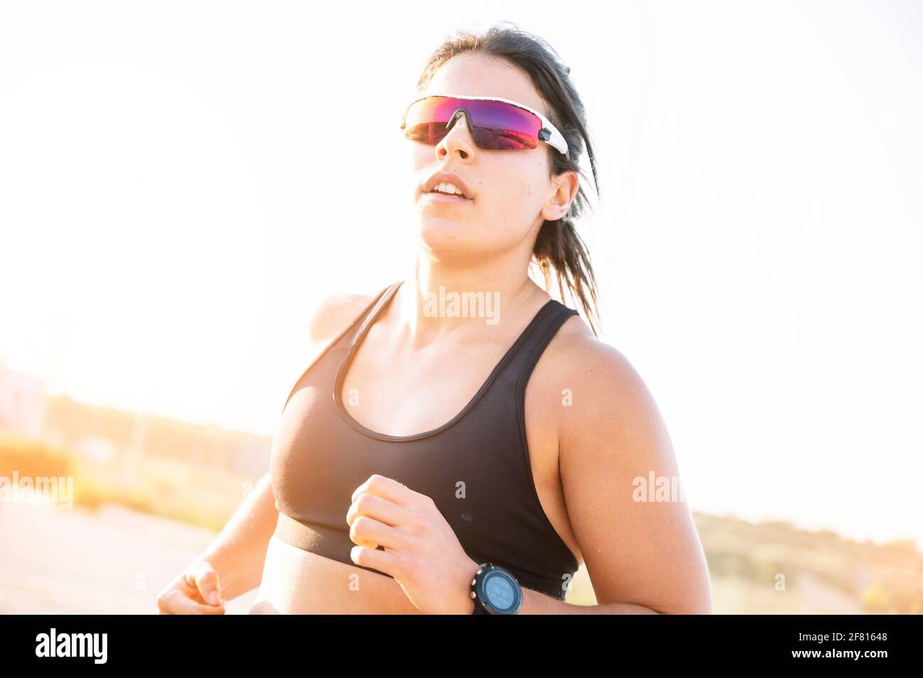Athletic woman running hi-res stock photography and images - Alamy