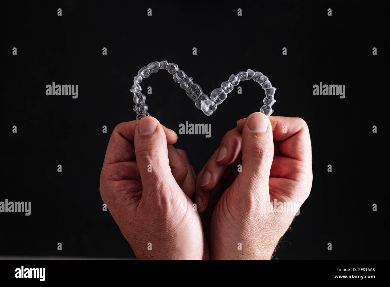 Heart shaped teeth hi-res stock photography and images - Alamy