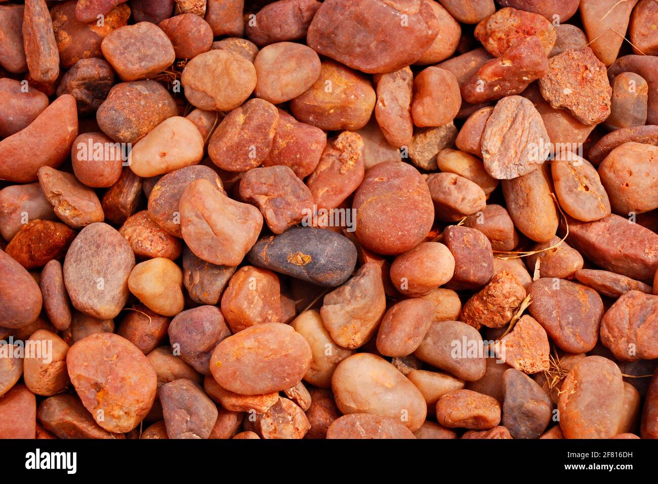decorative rustic pink pebble stones in close up Stock Photo - Alamy