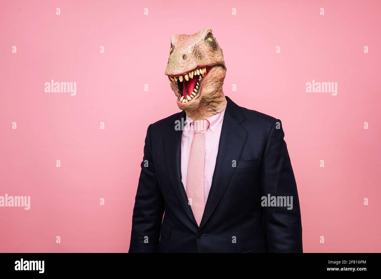 Portrait of man with lizard head and tie Stock Photo - Alamy
