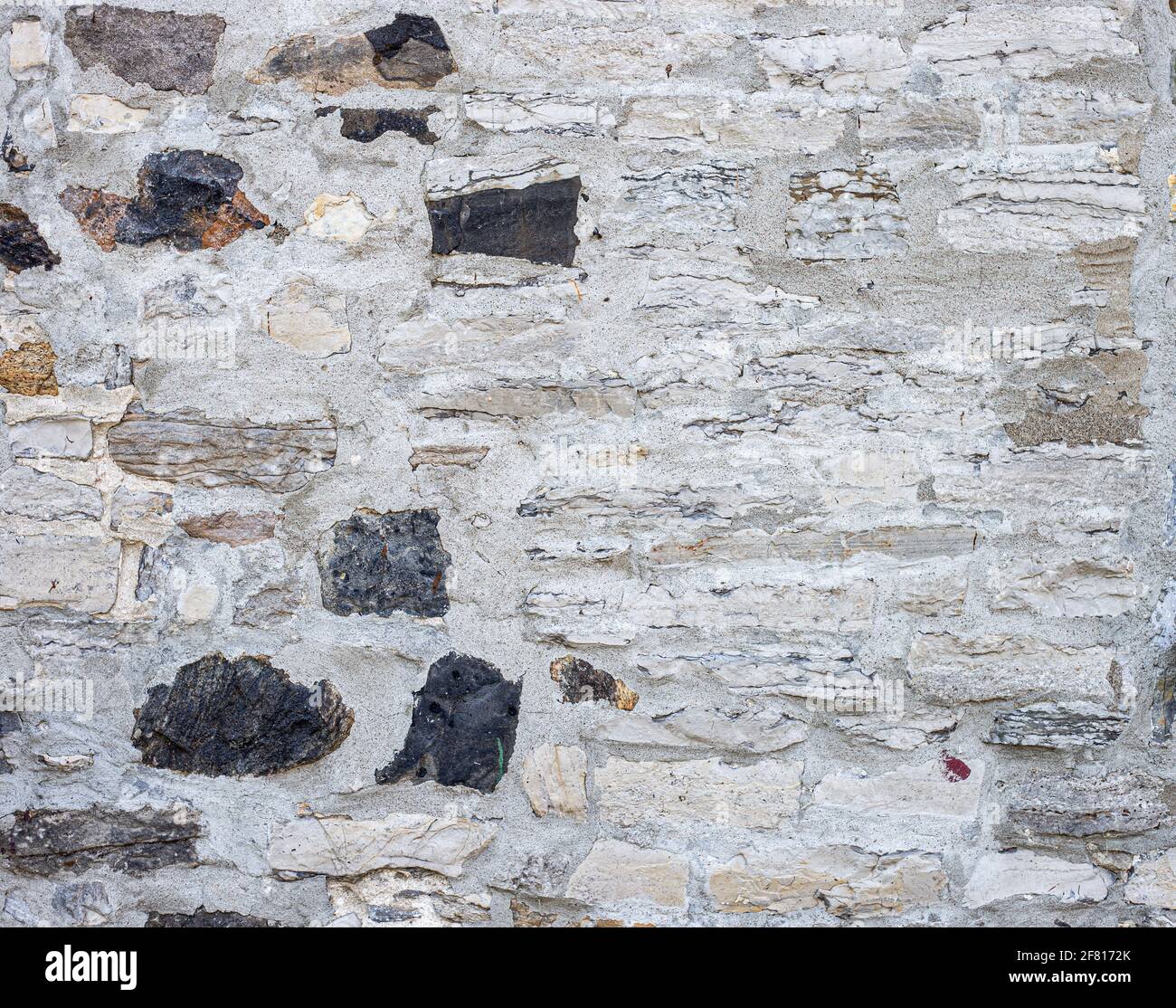 textured stone wall with soft light Stock Photo - Alamy