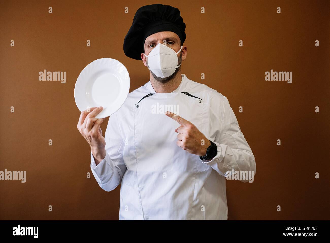 Chef with mask hi-res stock photography and images - Alamy