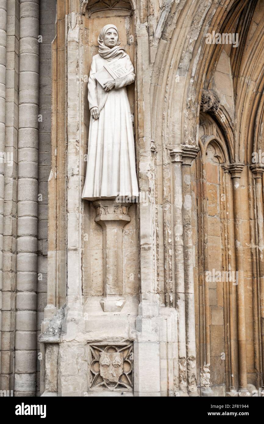The statue of Mother Julian at the entrance to Norwich Cathedral Stock ...