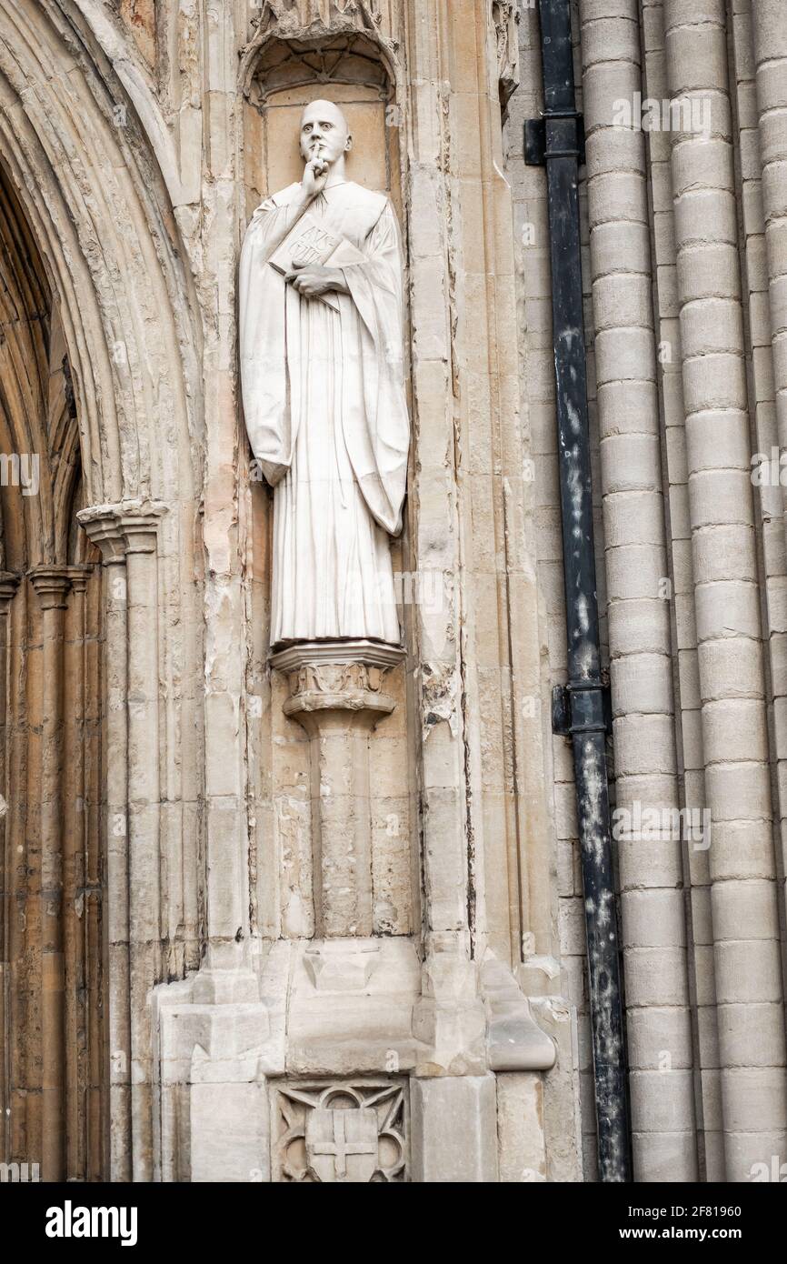 The statue of St Benedict at the entrance to Norwich Cathedral Stock ...