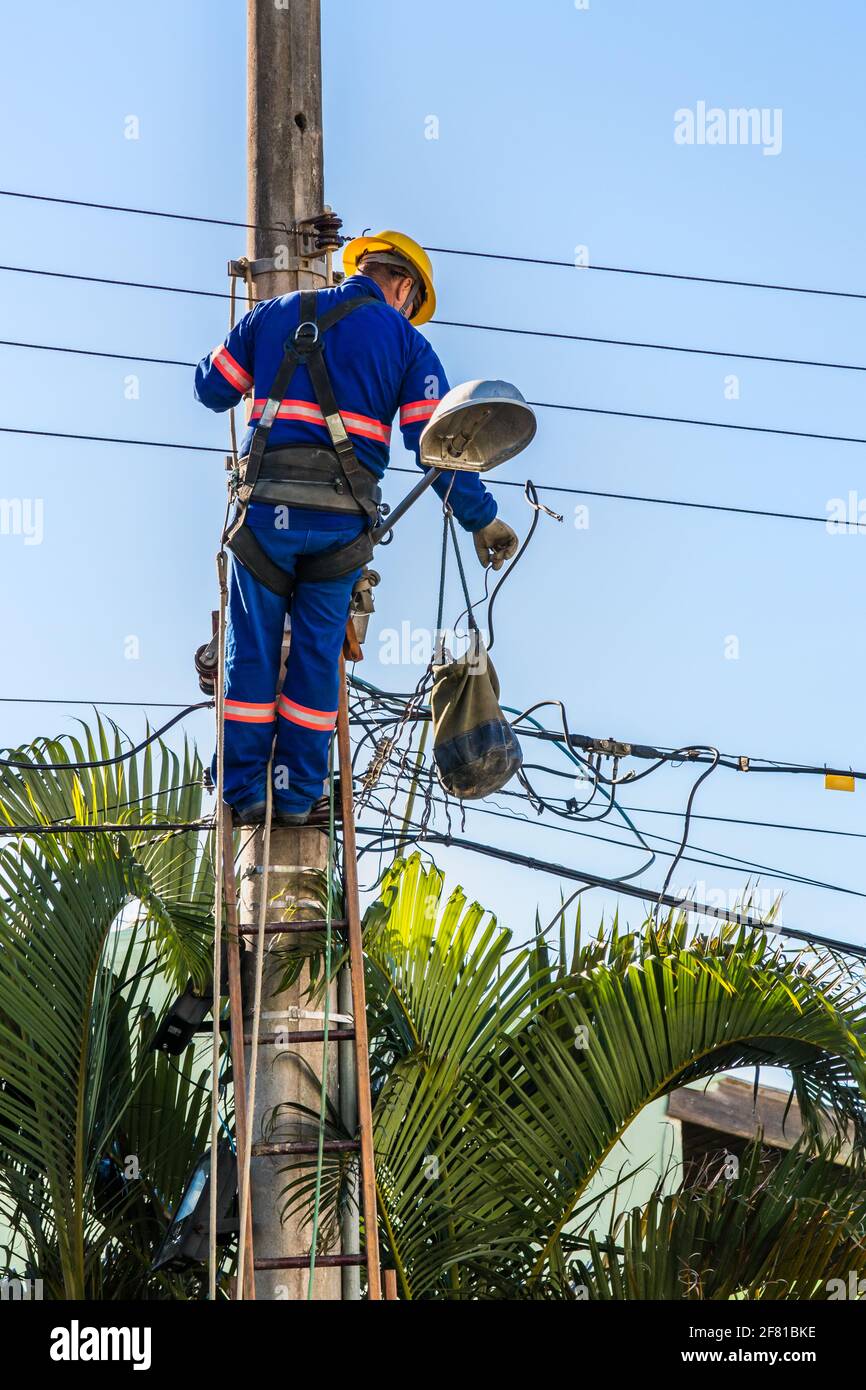 Electrician repairing electrical cables Stock Photo - Alamy