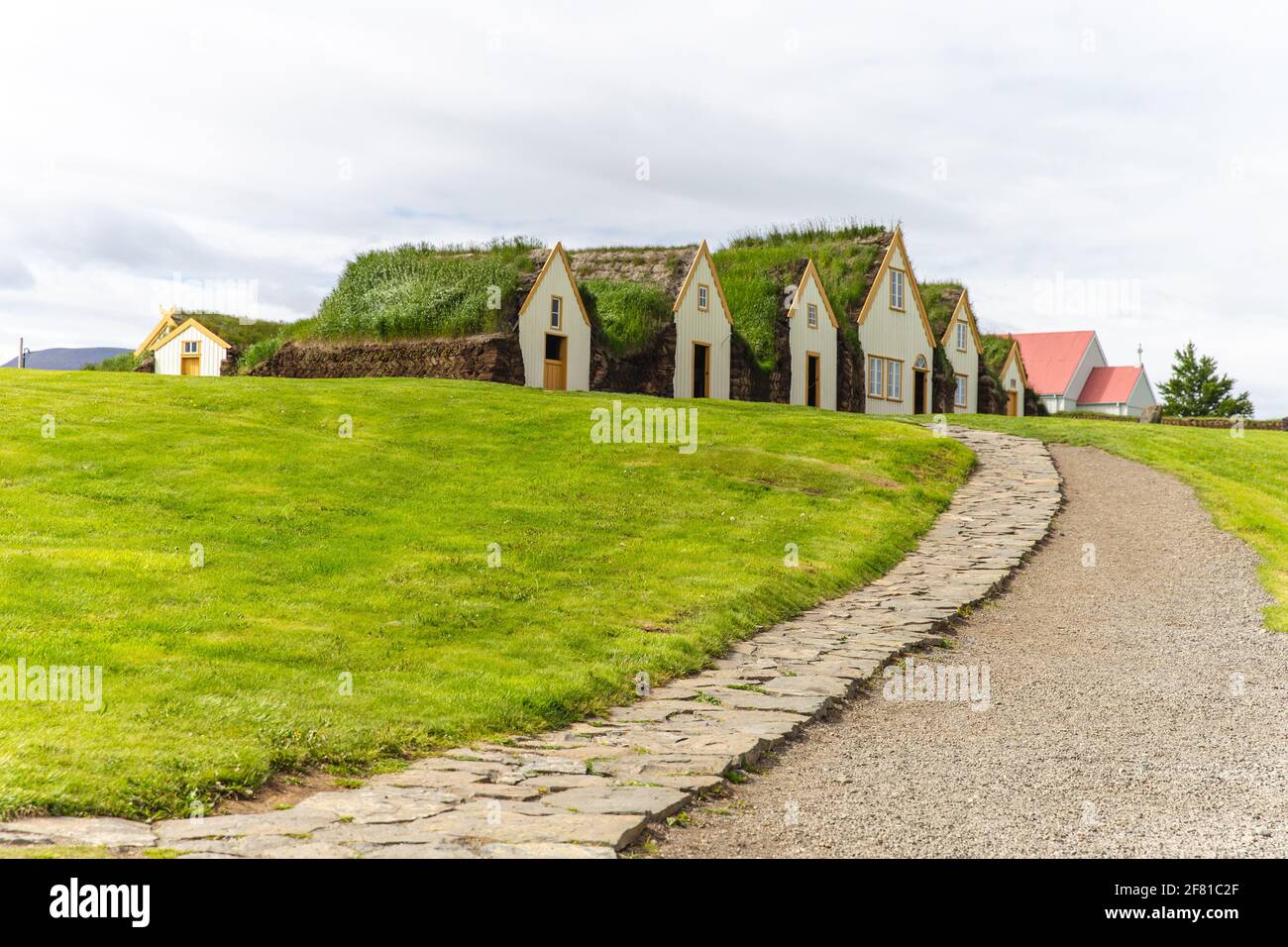 small houses with super green grass covering them Stock Photo - Alamy