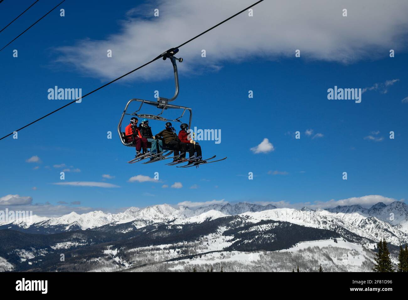 Ski chair lift with skiers. Ski resort in Vail, Colorado, USA Stock ...