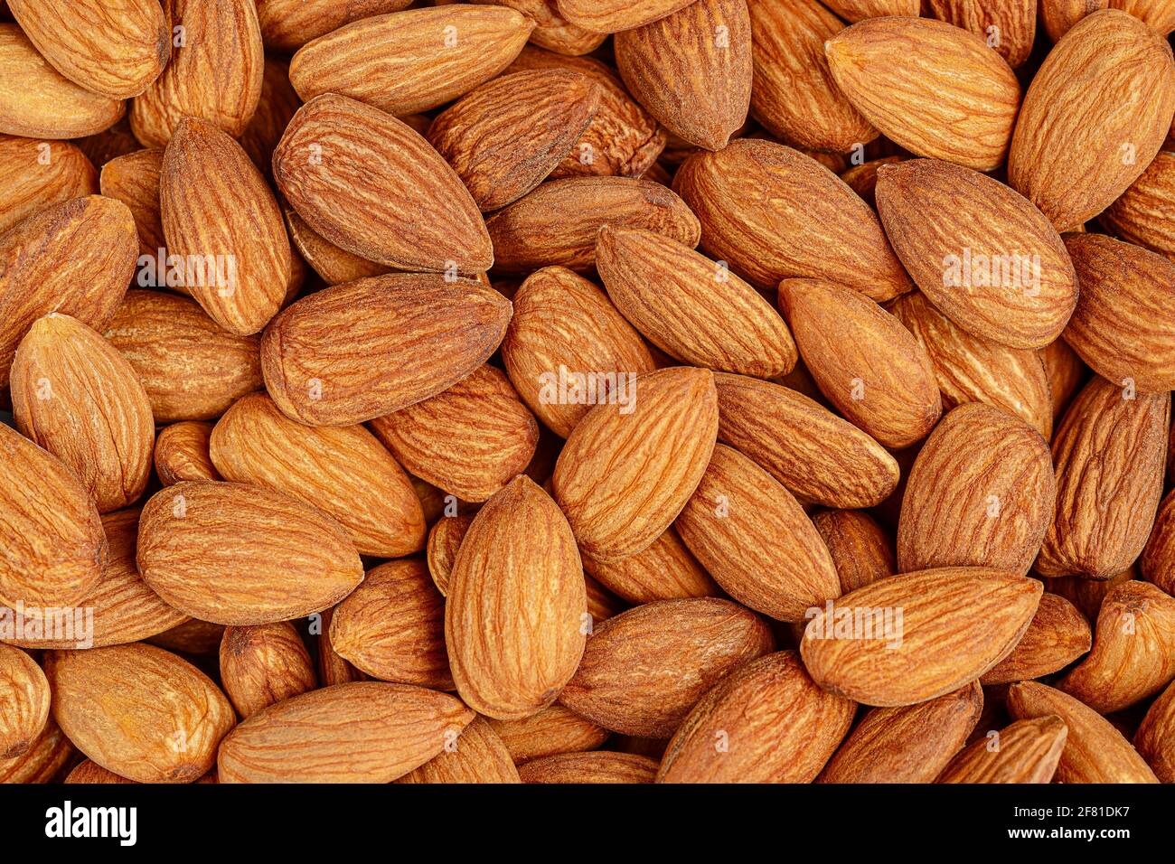 Pattern of peeled organic almonds. Healthy eating, top view Stock Photo ...