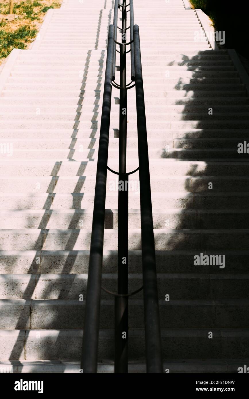 Vertical shot of stairs with shadows Stock Photo - Alamy