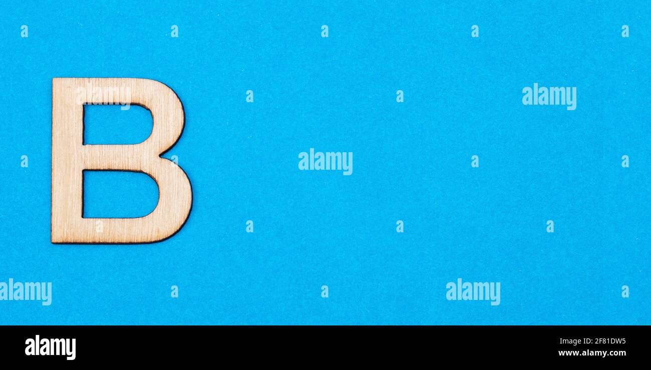 Letter B in white color on blue background Stock Photo - Alamy