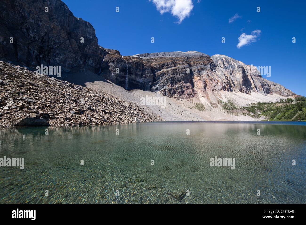 high contrast light on a clear lake in the mountains Stock Photo - Alamy