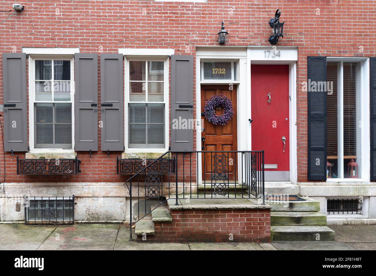 Rows of brownstone apartment buildings in Center City with windows ...