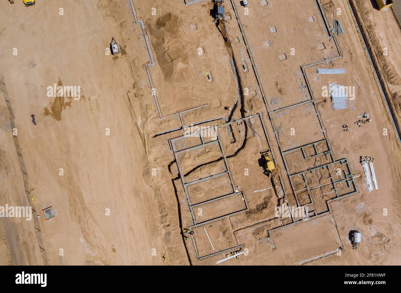 Building construction real property of trenches dug in ground and ...