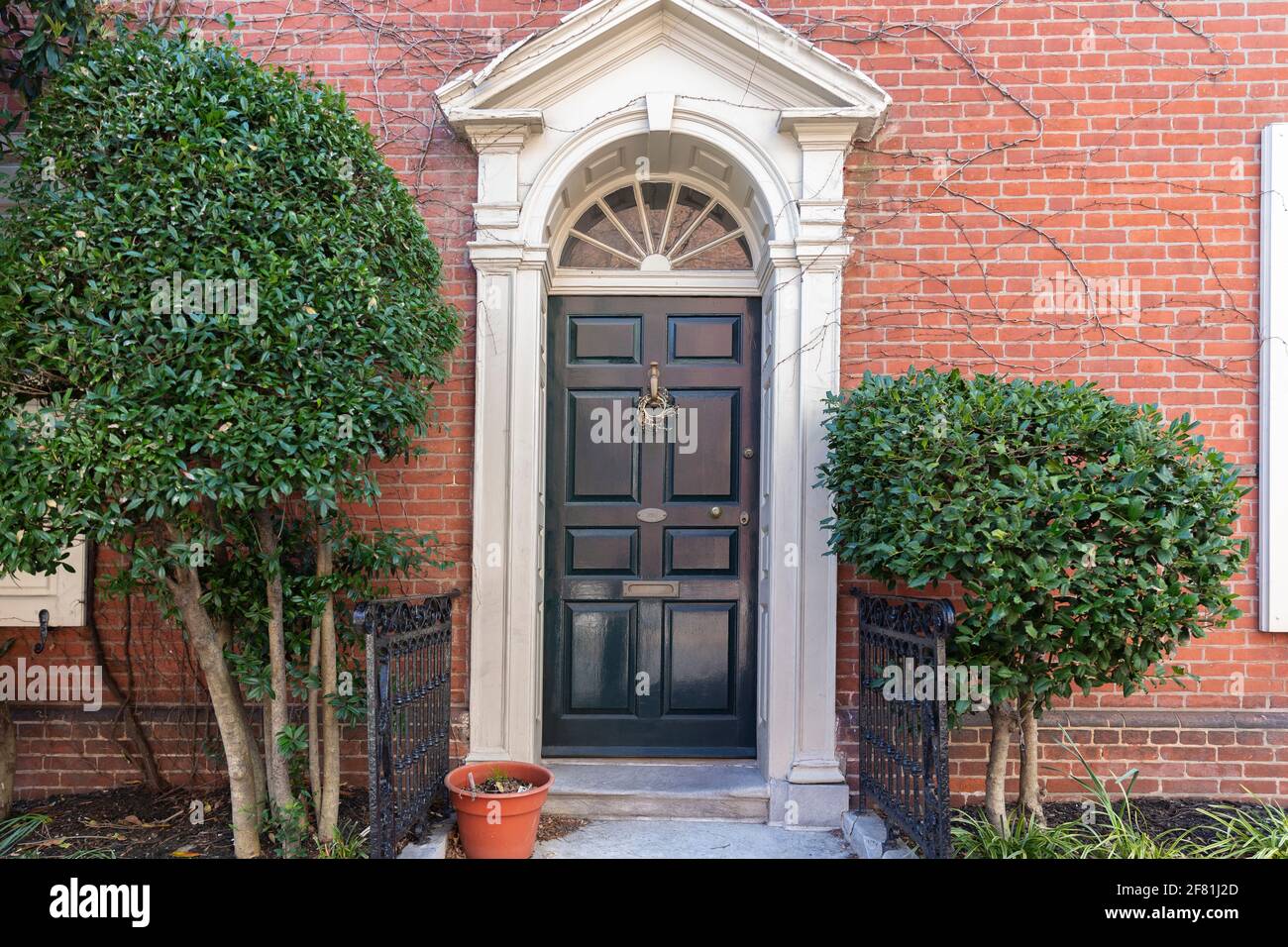 Front of brownstone apartment building in Center City with windows ...