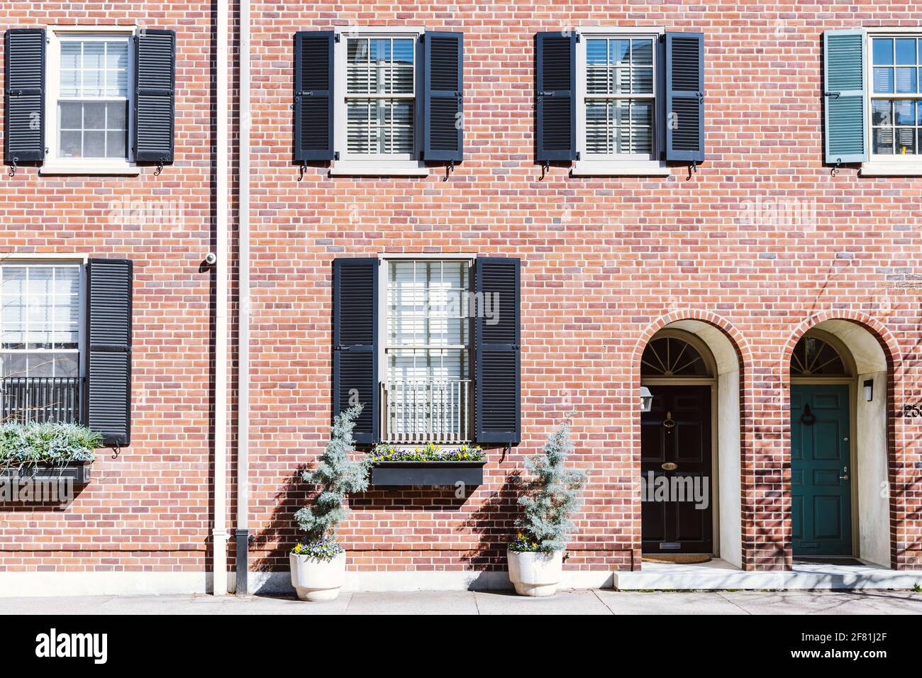 Front of brownstone apartment building in Center City with windows ...