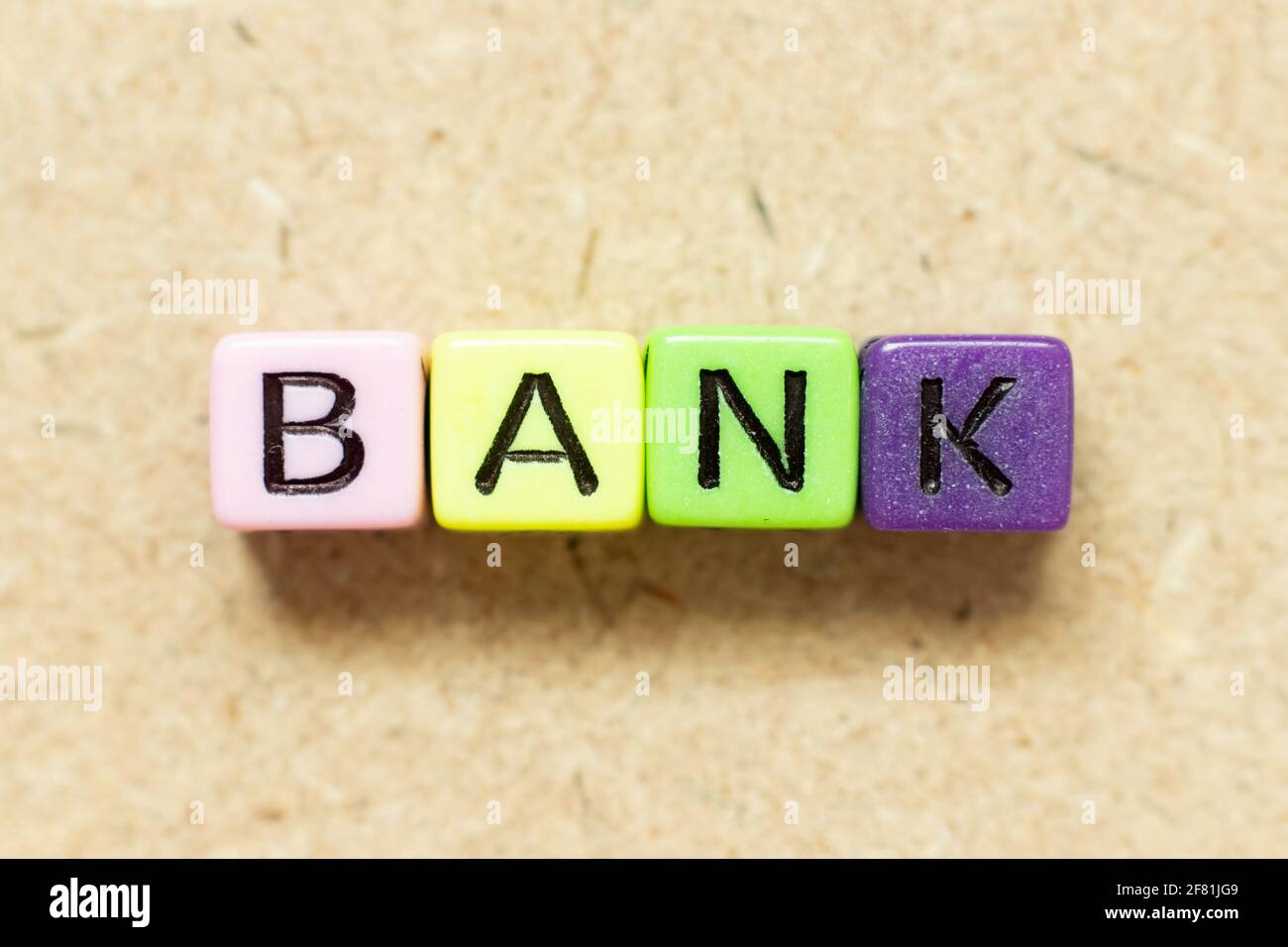 Color alphabet letter block in word bank on wood background Stock Photo ...