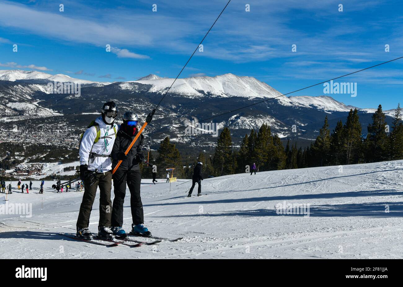 People using t-bar ski lift to get on the top of Breckenridge, Colorado ...