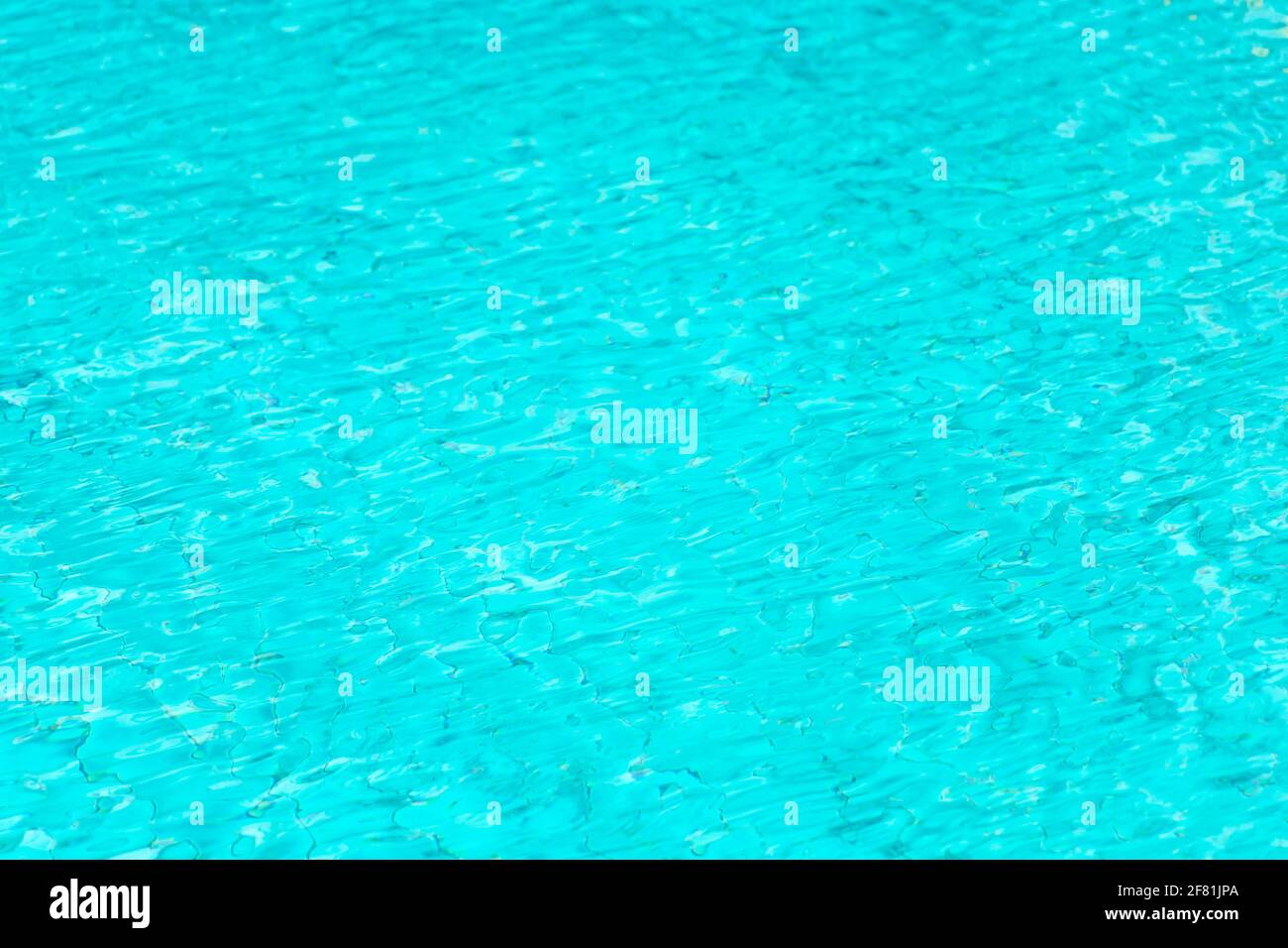 Ripple Water in swimming pool with blue tile floor background Stock ...