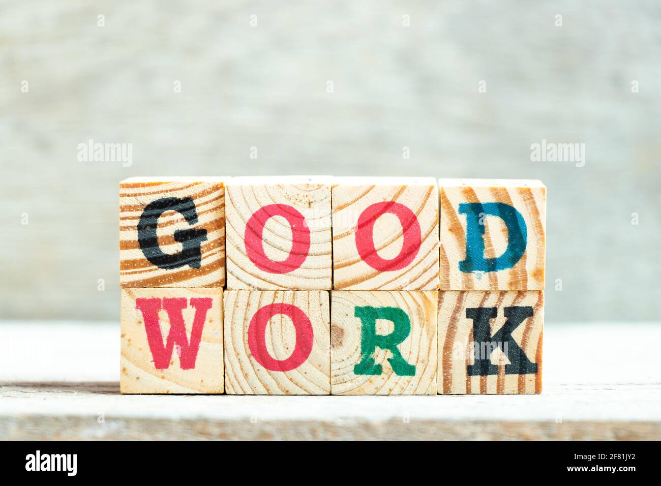 Alphabet letter block in word good work on wood background Stock Photo ...