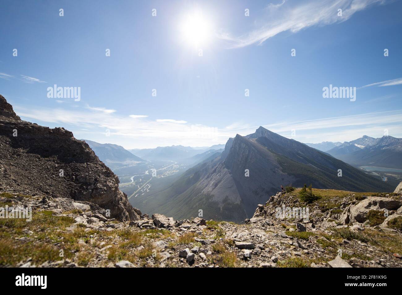 view of a mountain down the valley from a high point of view in summer ...