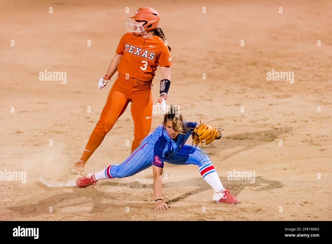 Girl softball player sliding into base hi-res stock photography and ...