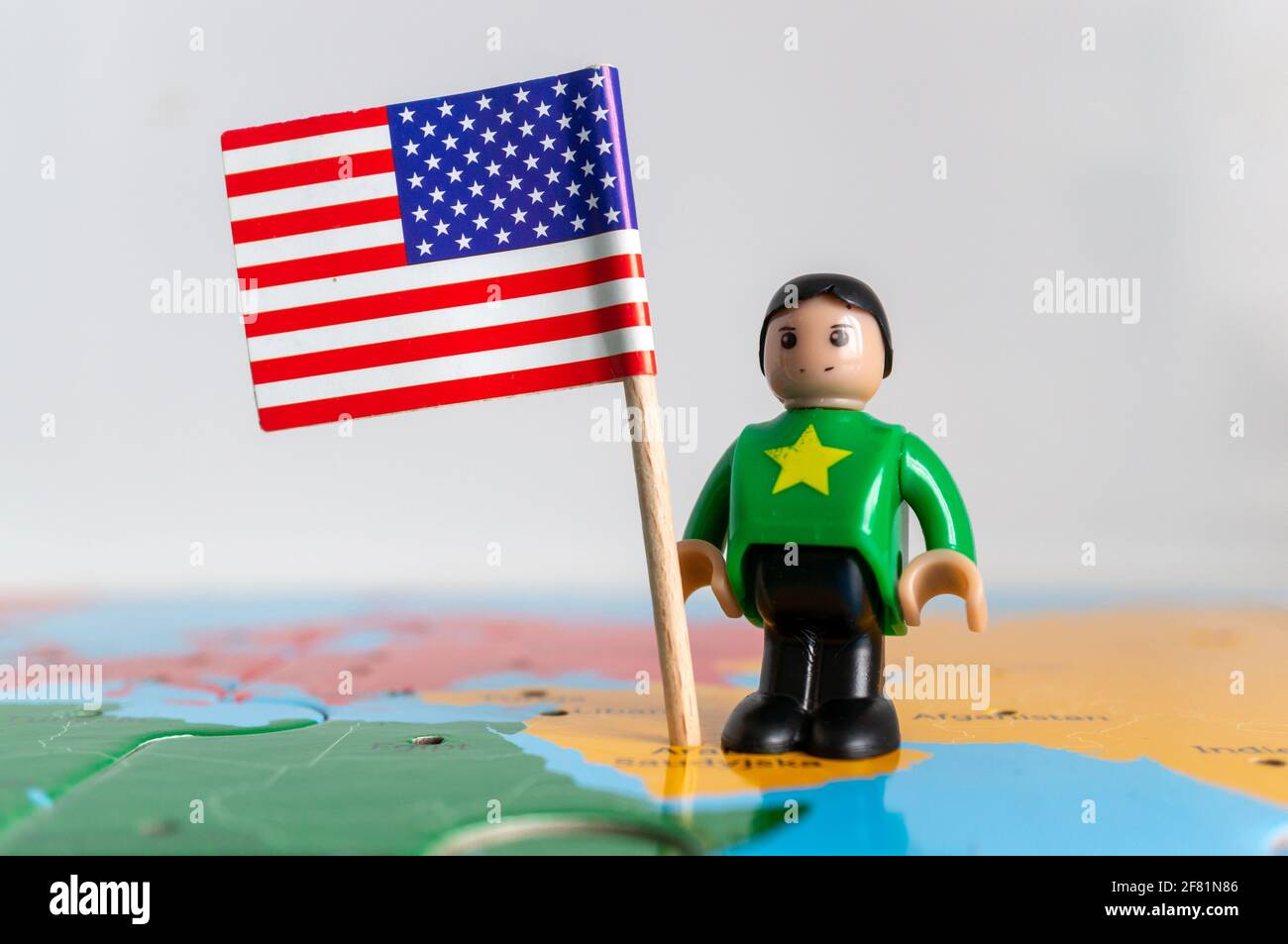 POZNAN, POLAND - Apr 06, 2021: Playtive toy figurine standing next to a ...