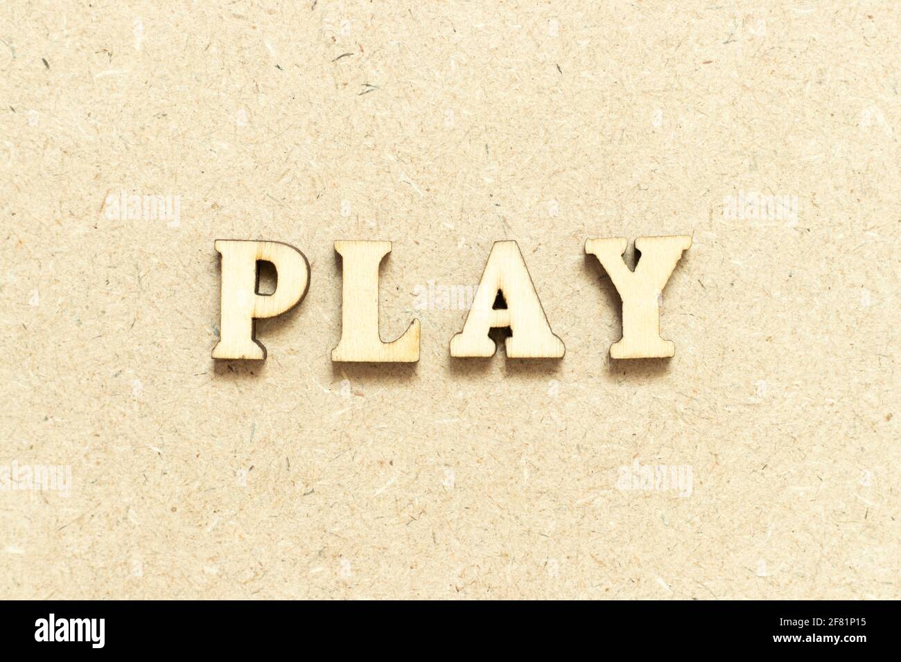 Alphabet letter in word play on wood background Stock Photo - Alamy