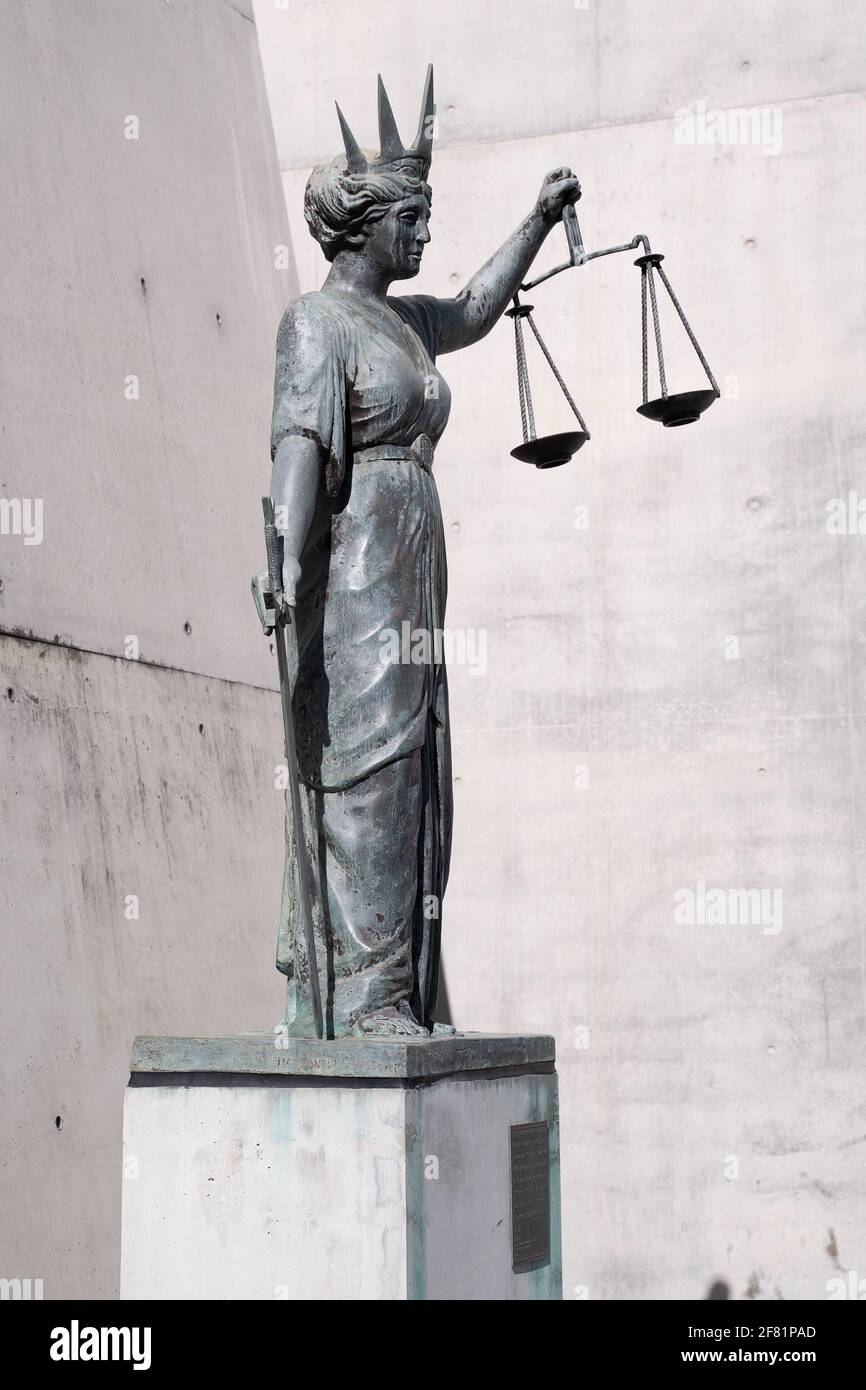 Statue of Lady Justice with the sword in one hand and the scales of ...