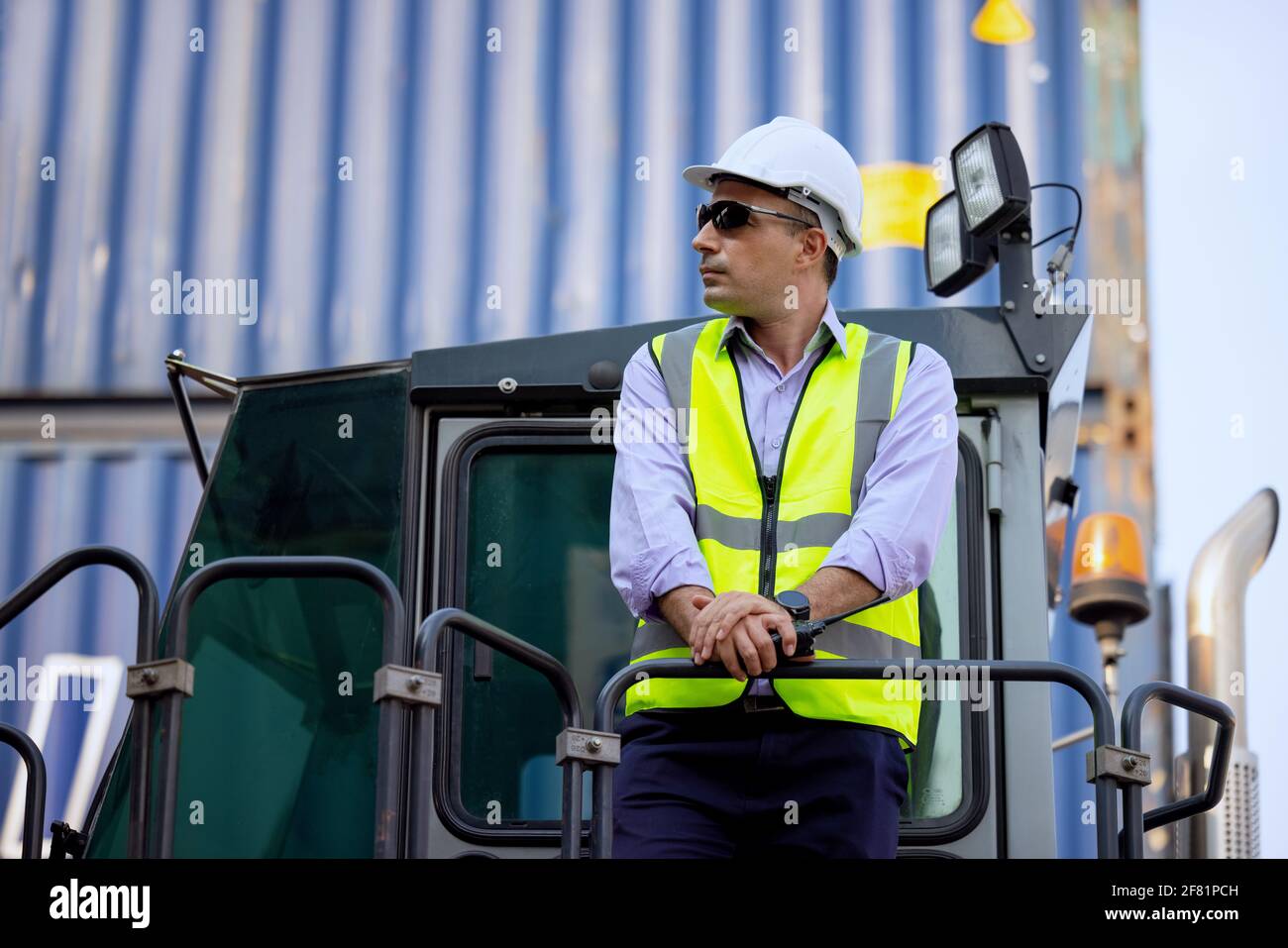 Construction man driver with excavator outdoor site, Industrial Manager ...