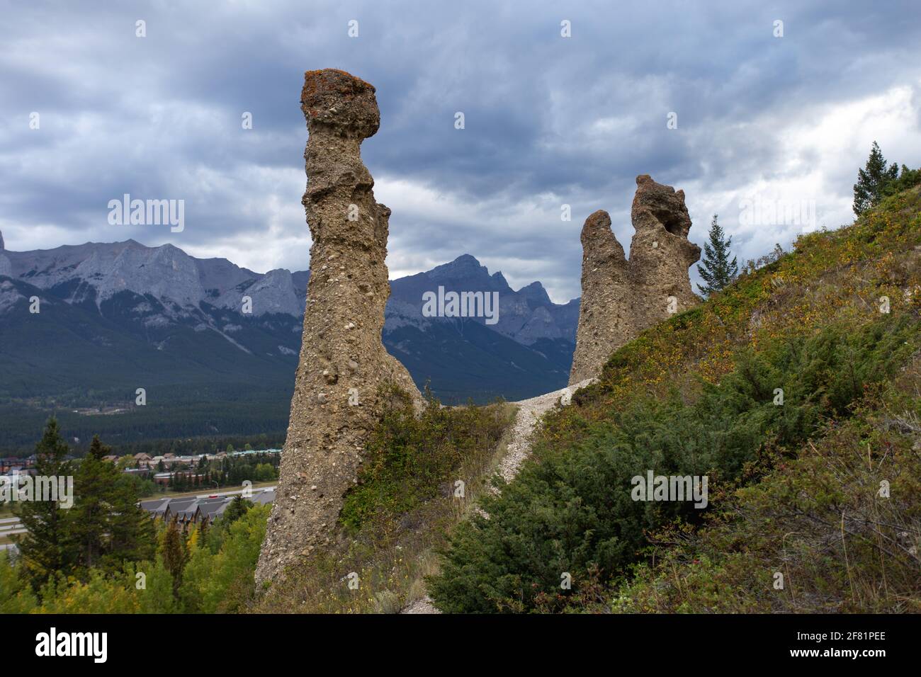 rock formation on the side of a mountain in summer on an overcast day ...
