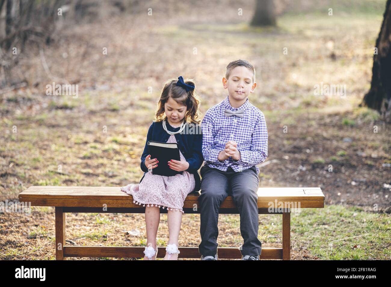 Holy bible on bench in hi-res stock photography and images - Alamy