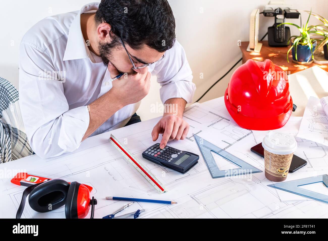 Businessman Doing Calculations High Resolution Stock Photography and ...