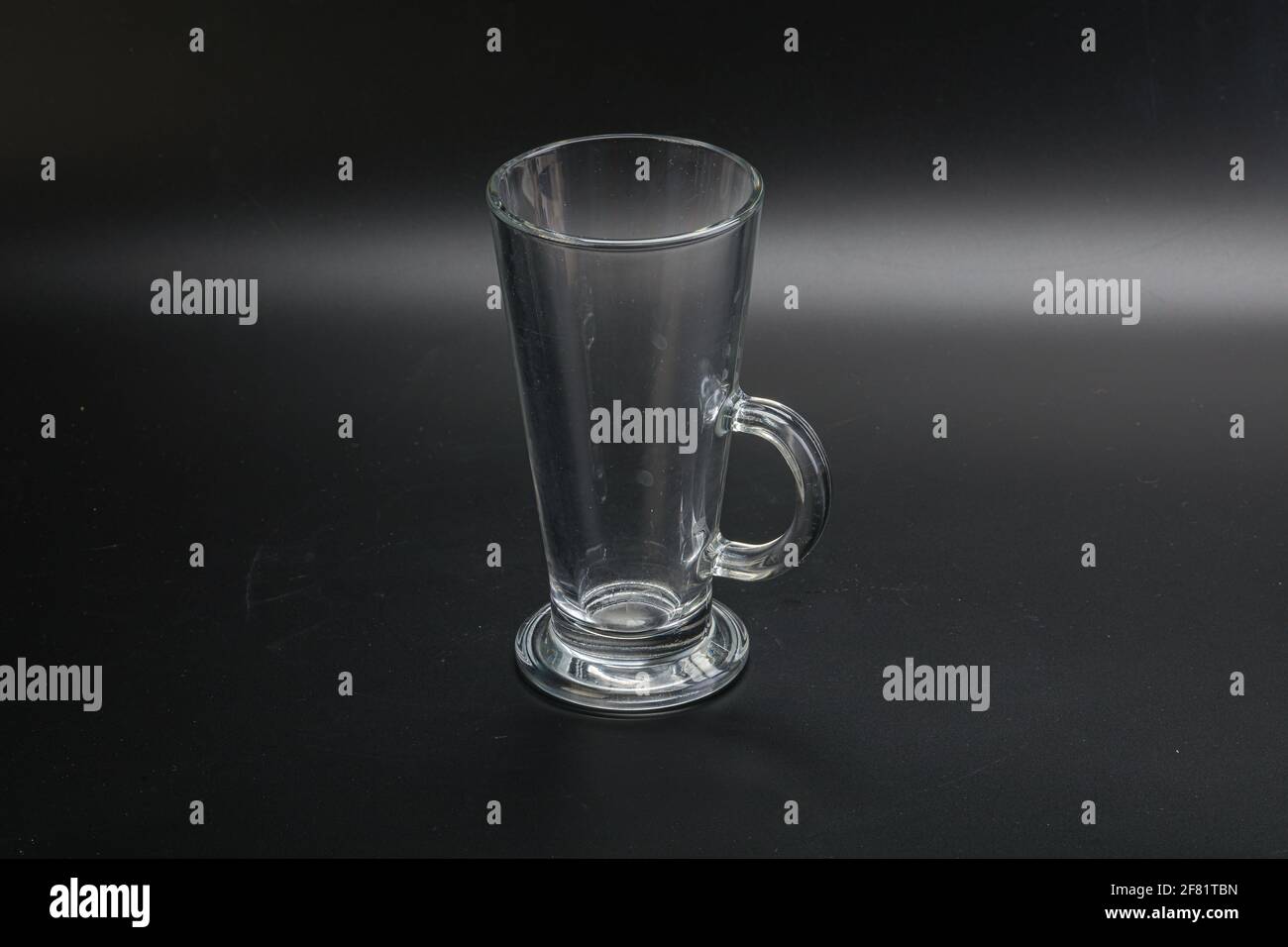 Empty glass cup for drinks isolated Stock Photo - Alamy