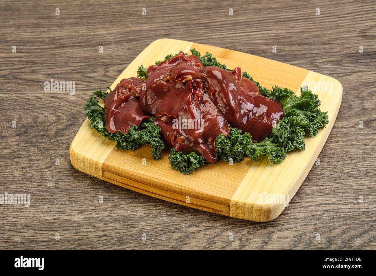 Raw chicken liver over board for cooking Stock Photo - Alamy