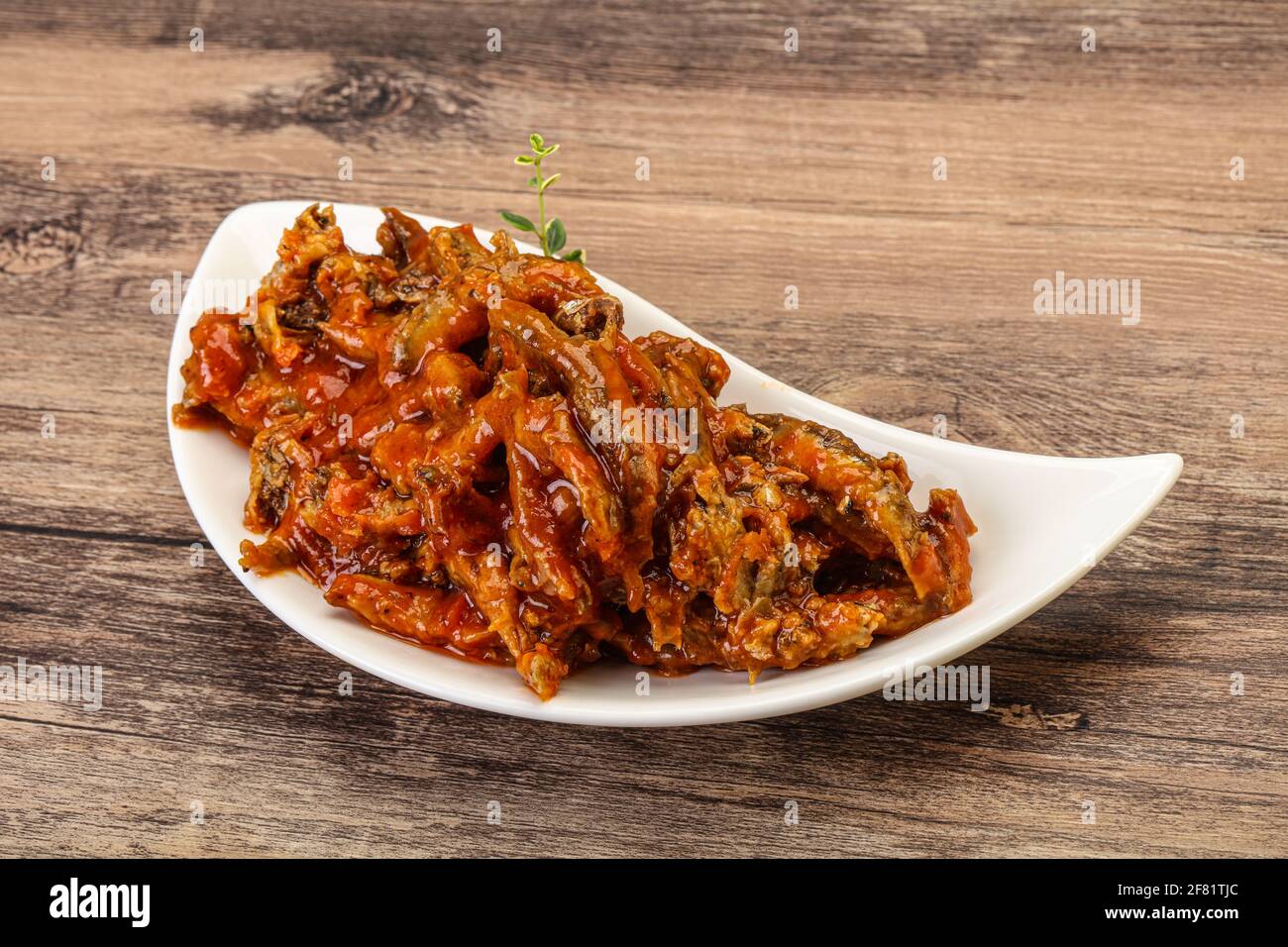Canned anchovy snack in tomato sauce Stock Photo - Alamy