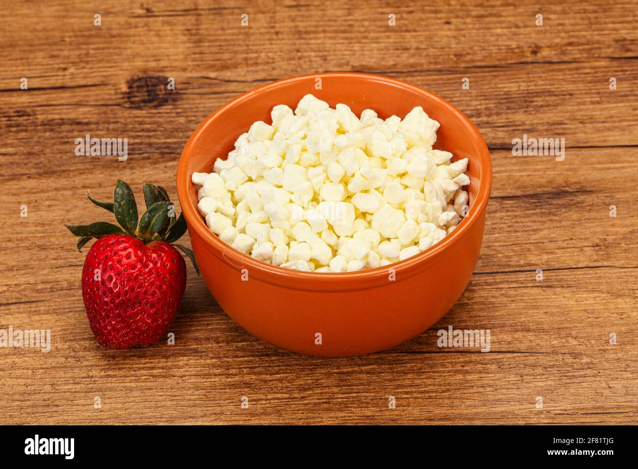 Dietary food - grain cottage cheese in the bowl Stock Photo - Alamy